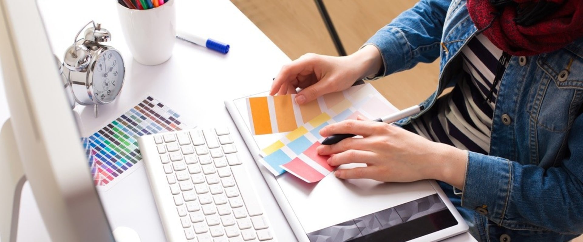 Where do most graphic designers work?